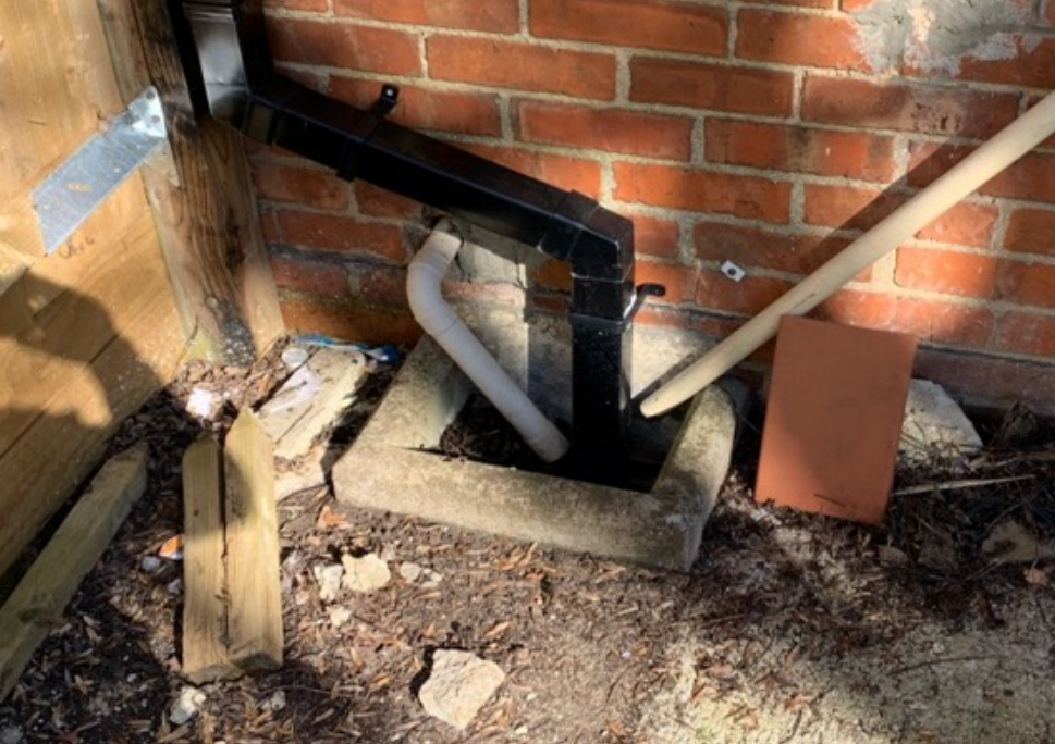 Open gully in back of property - how common/bad is this ...